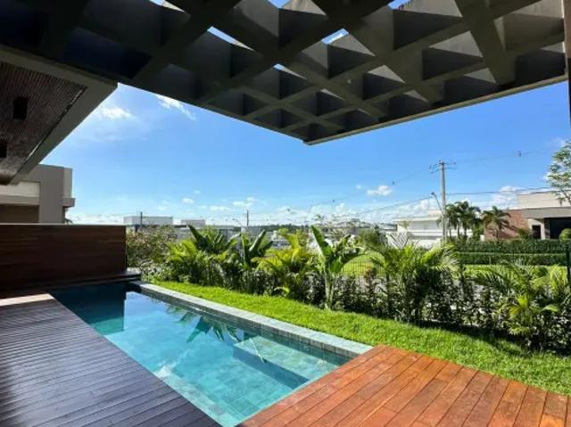 Casa de Condomínio com 4 Quartos e 5 banheiros à Venda, 506 m² por R$ 5.350.000