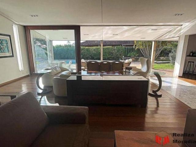 Casa de Condomínio com 4 Quartos e 5 banheiros à Venda