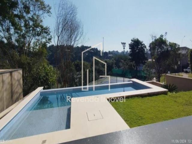 Casa de Condomínio com 4 Quartos e 6 banheiros à Venda, 504 m²