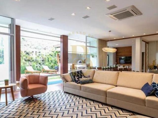 Casa de condomínio com 518 m², 4 quartos sendo 4 suítes à venda no bairro Jardim Cordeiro