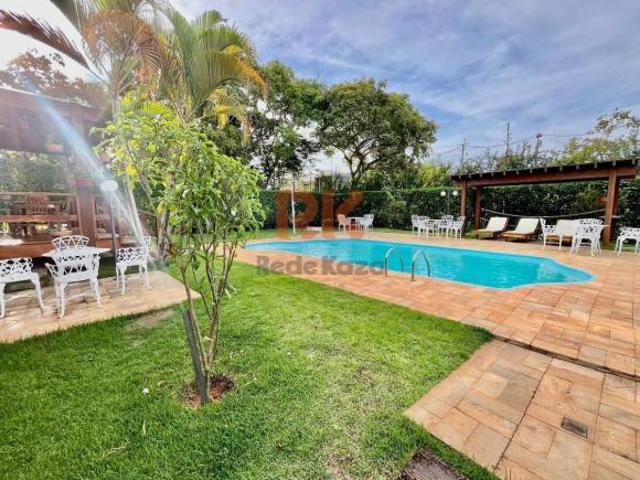 Casa de Condomínio com 5 Quartos e 5 banheiros à Venda, 380 m² por R$ 2.950.000,00