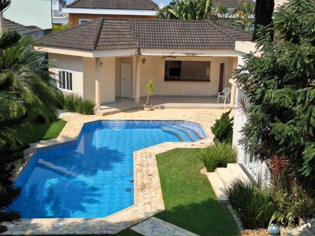 Casa de Condomínio com 5 Quartos e 7 banheiros à Venda, 565 m² por R$ 5.500.000