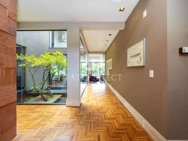 Casa de condomínio com 605.29 m², 4 quartos sendo 4 suítes à venda no bairro Campo Comprido