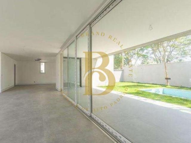 Casa de condomínio com 749 m², 4 quartos sendo 4 suítes à venda no bairro Jardim Cordeiro