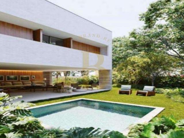 Casa de condomínio com 701.9 m², 4 quartos sendo 3 suítes à venda no bairro Jardim Petropolis