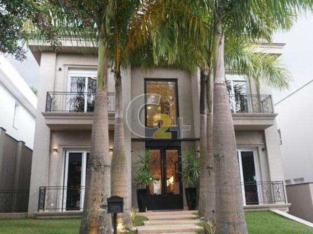 Casa de condomínio á venda em Alphaville, 5 suítes, 5 vagas de garagem