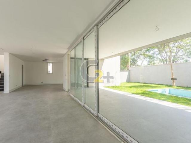 Casa de condomínio á venda em Santo Amaro, 4 suítes, 4 vagas de garagem