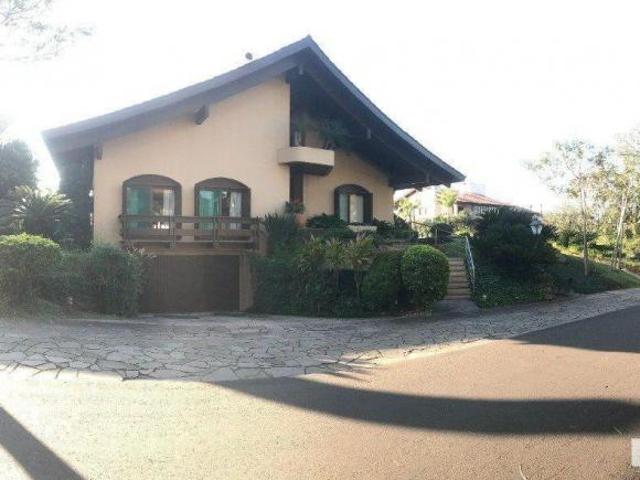Casa de Condomínio em Cavalhada