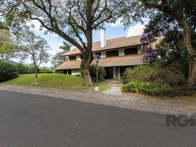 Casa de Condomínio em Cavalhada