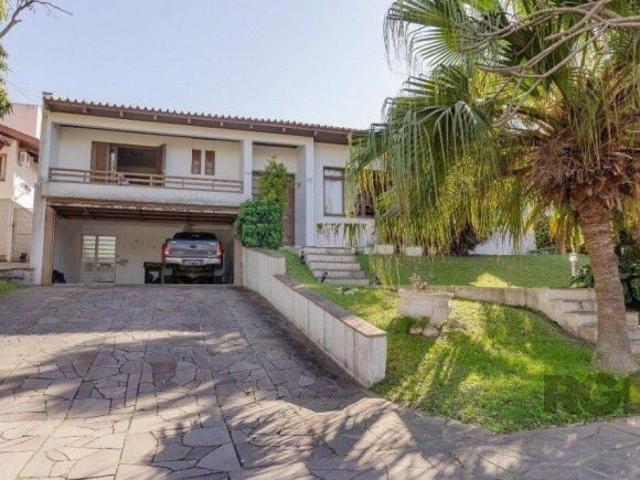 Casa de Condomínio em Cavalhada
