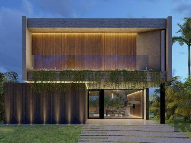 Casa de Condomínio em Atlântida Sul