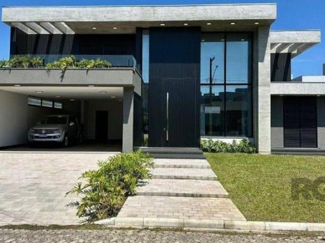 Casa de Condomínio em Atlântida