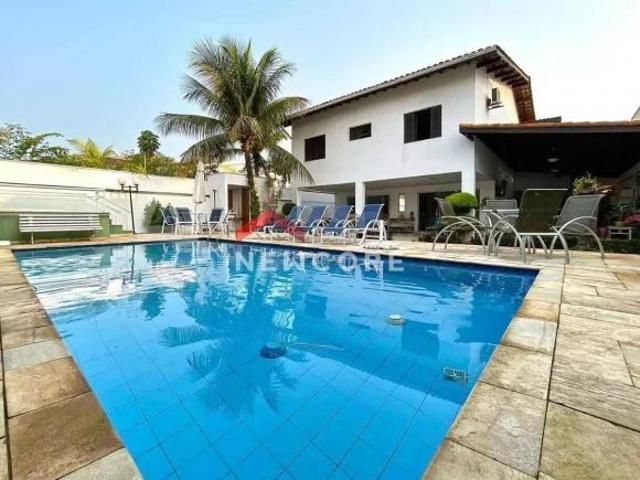 Casa de condomínio em Avenida Kensei Tamayose Jardim Acapulco Guarujá/SP