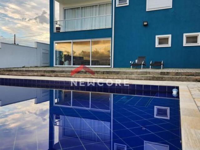 Casa de condomínio em Avenida Palmeira do Lago Loteamento Residencial Parque Lago Dourado Jacar