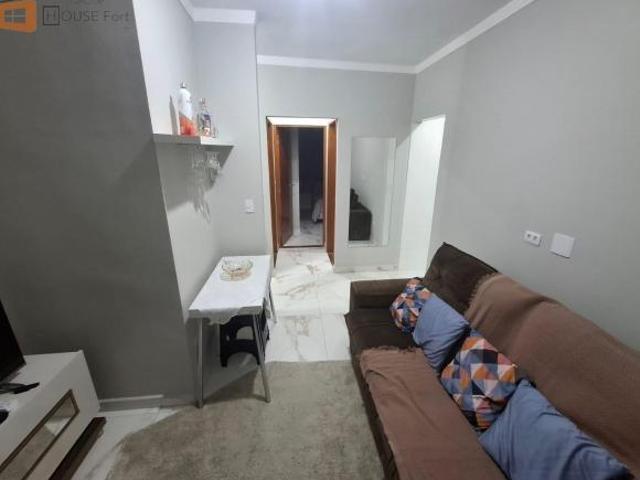 Casa de Condominio em Guilhermina Praia Grande, SP