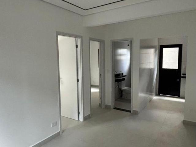 Casa de Condominio em Guilhermina Praia Grande, SP