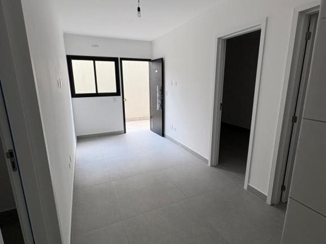Casa de Condominio em Guilhermina Praia Grande, SP