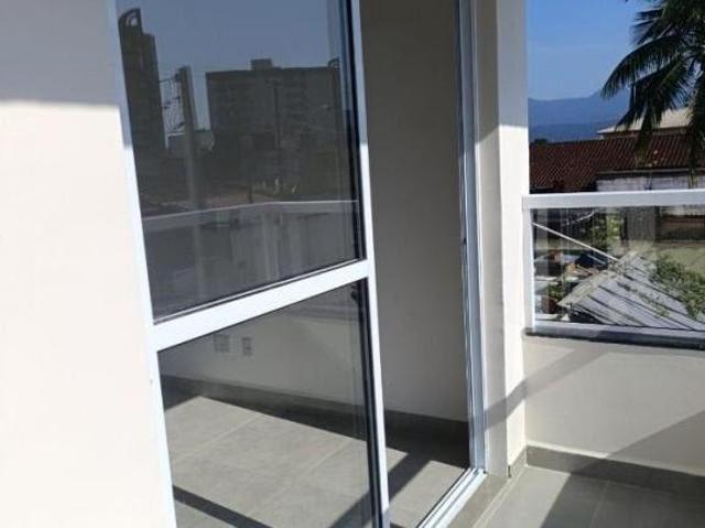 Casa de Condomínio em Nova Mirim Praia Grande, SP