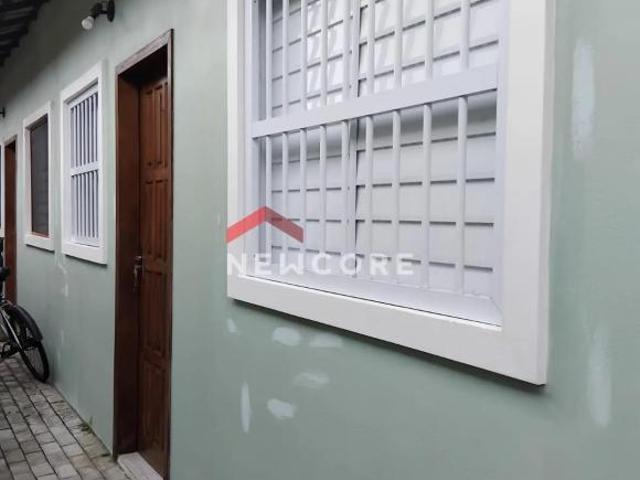 Casa de condomínio em Rua Berilo Cidade da Criança Praia Grande/SP