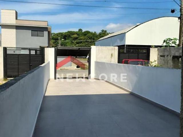 Casa de condomínio em Rua Itália Baffi Magni Massaguaçu Caraguatatuba/SP