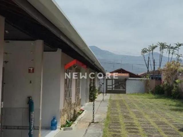 Casa de condomínio em Rua Poços de Caldas Real Praia Grande/SP