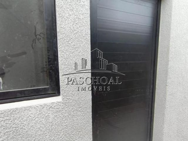 Casa de condominio sobrado com quintal exclusivo na Jd. Real Praia Grande. Pronta para morar