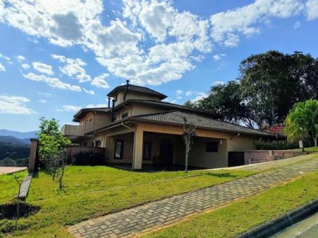 Casa de condomínio para venda com 930 metros quadrados com 7 quartos
