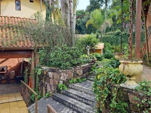 Casa de Condomínio para venda e aluguel em Cumbari de 400.00m² com 4 Quartos, 2 Suites e 2 Garagens
