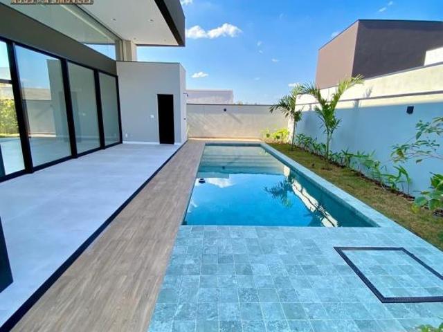 Casa de Condomínio para venda e aluguel em Alphaville Nova Esplanada 3 de 367.59m² com 4 Quartos, 4
