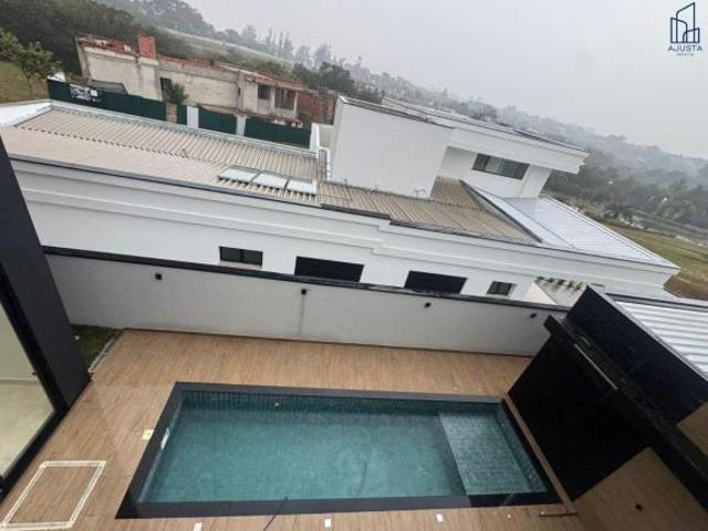 Casa de Condomínio para venda e aluguel em Bela Vista de 370.00m² com 3 Quartos, 3 Suites e 3 Garage
