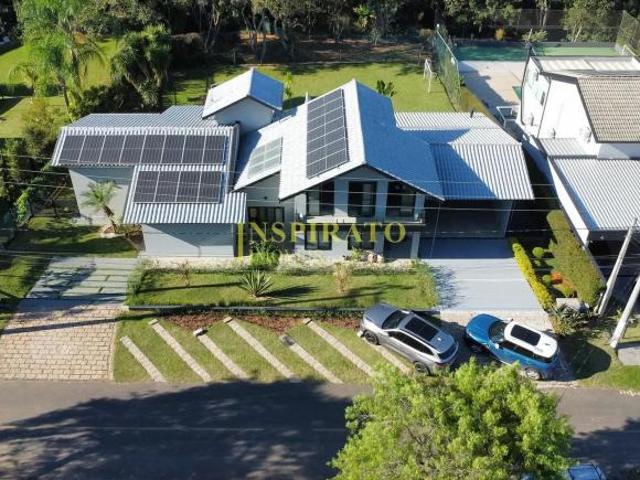 Casa de Condomínio para venda e aluguel em Medeiros de 360.00m² com 4 Quartos, 4 Suites e 6 Garagens