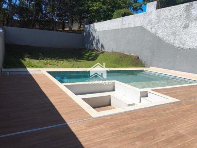 Casa de Condomínio para venda em Tanque de 618.00m² com 5 Quartos, 3 Suites e 4 Garagens