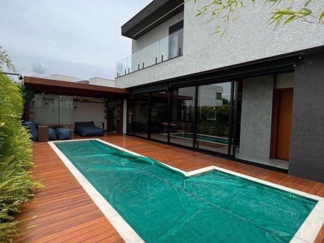 Casa de Condomínio para venda em Alphaville Nova Esplanada de 368.43m² com 3 Quartos, 3 Suites e 4 G