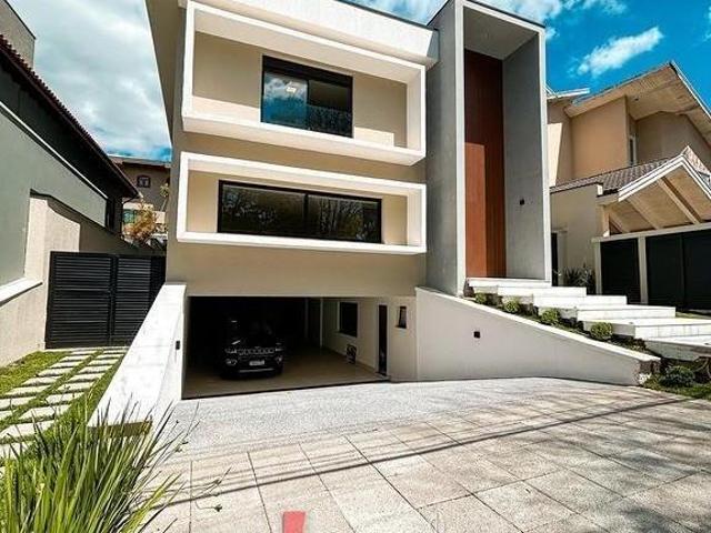 Casa de Condomínio para venda em Alphaville de 557.87m² com 4 Quartos, 4 Suites e 8 Garagens