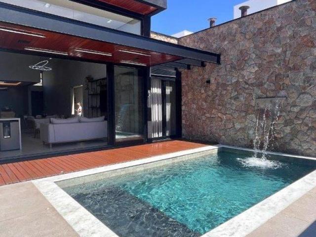 Casa de Condomínio para venda em Aparecidinha de 242.00m² com 3 Quartos, 3 Suites e 4 Garagens