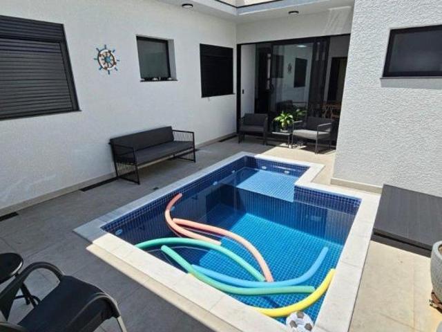 Casa de Condomínio para venda em Jardim Astro de 179.00m² com 3 Quartos, 3 Suites e 4 Garagens