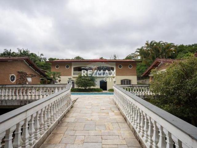 Casa de Condomínio para venda em Jardim Maria de 593.00m² com 5 Quartos, 4 Suites e 6 Garagens