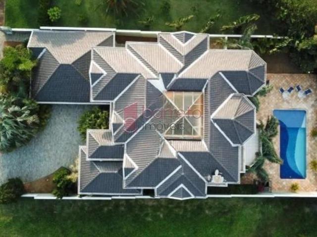 Casa de Condomínio para venda em Jundiaí Mirim de 665.00m² com 4 Quartos, 4 Suites e 9 Garagens