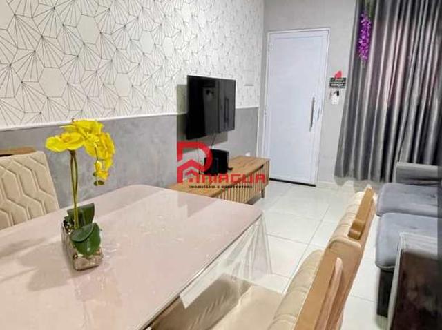 Casa de Condomínio para venda em Maracanã em Praia Grande São Paulo de 66.00m² com 2 Quartos e 1 Garagem