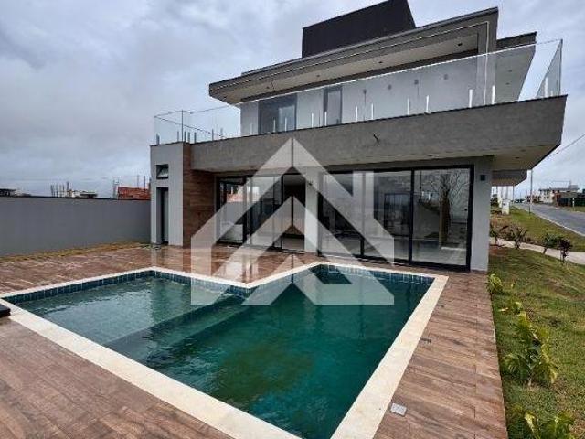 Casa de Condomínio para venda em Riviera de 170.00m² com 3 Quartos, 3 Suites e 2 Garagens