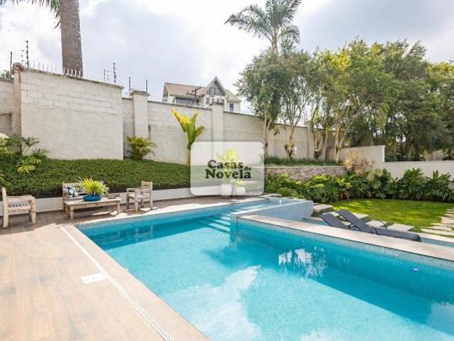 Casa de Condomínio para venda em Santa Felicidade de 396.00m² com 4 Quartos, 4 Suites e 6 Garagens
