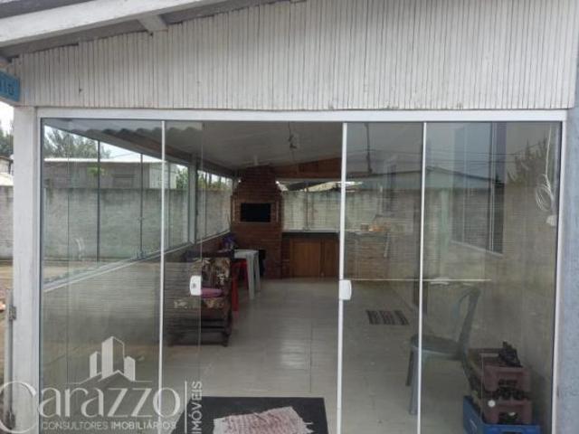 casa de dois dormitórios com anexo em tramandaí
