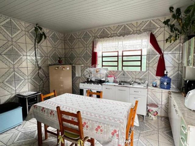 Casa de esquina com amplo terreno bem localizada, no bairro Belvedere