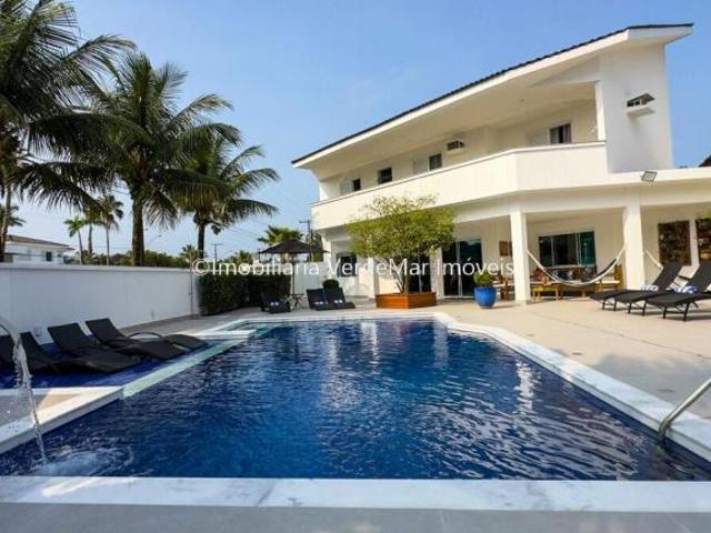 Casa de esquina a venda no Jardim Acapulco em Guarujá