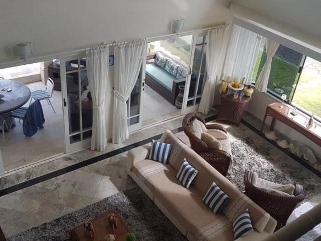 Casa de Esquina á venda no Jardim Acapulco no Guarujá | QVista Inteligência I.
