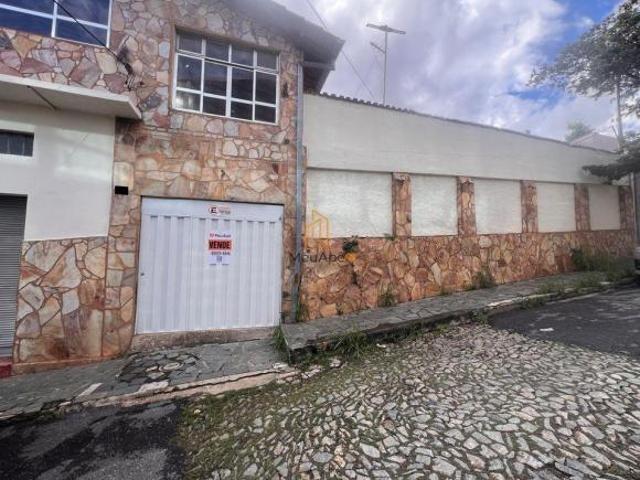 Casa de esquina no santo André com duas lojas e garagem coberta