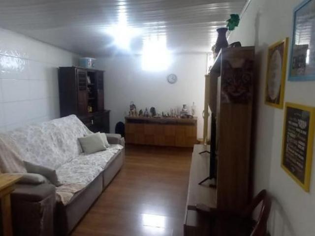 casa de fundos de 2 dormitorio com vaga, 52 m2 de área útil, no Bairro Aparício Borges