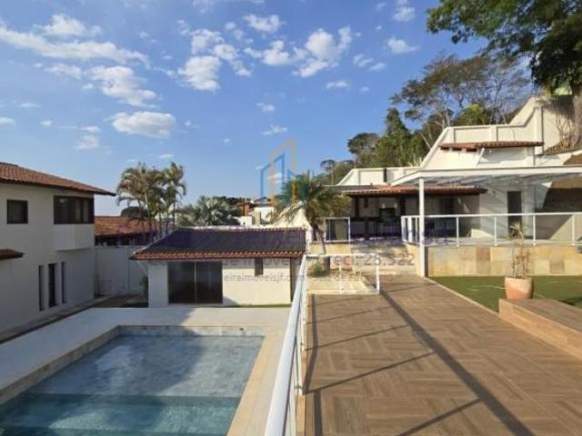 Casa de Luxo 5 suítes, piscina, área gourmet, 6 vagas, linda vista à venda no Condominio Parque Impe