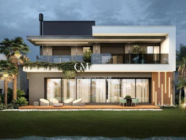 Casa de luxo com 4 suítes Condomínio Ilhas Park a poucos metros do mar Torres RS