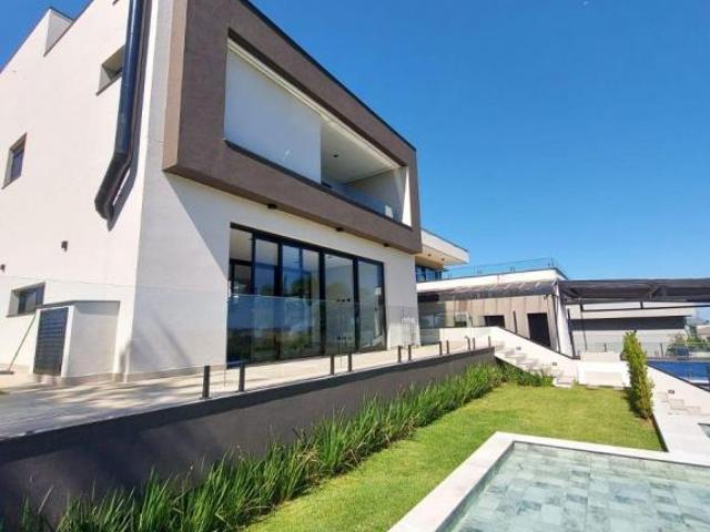 Casa de luxo com 4 suítes e linda vista no Campos do Conde
